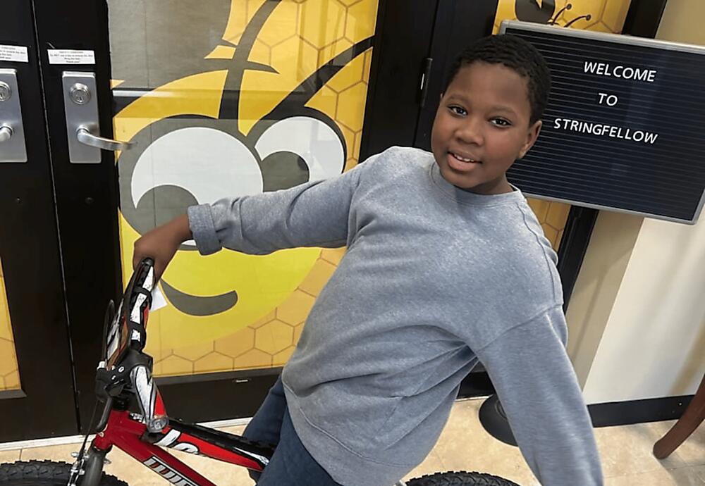 Student Receives Bike for Perfect Attendance | Stringfellow Elementary ...