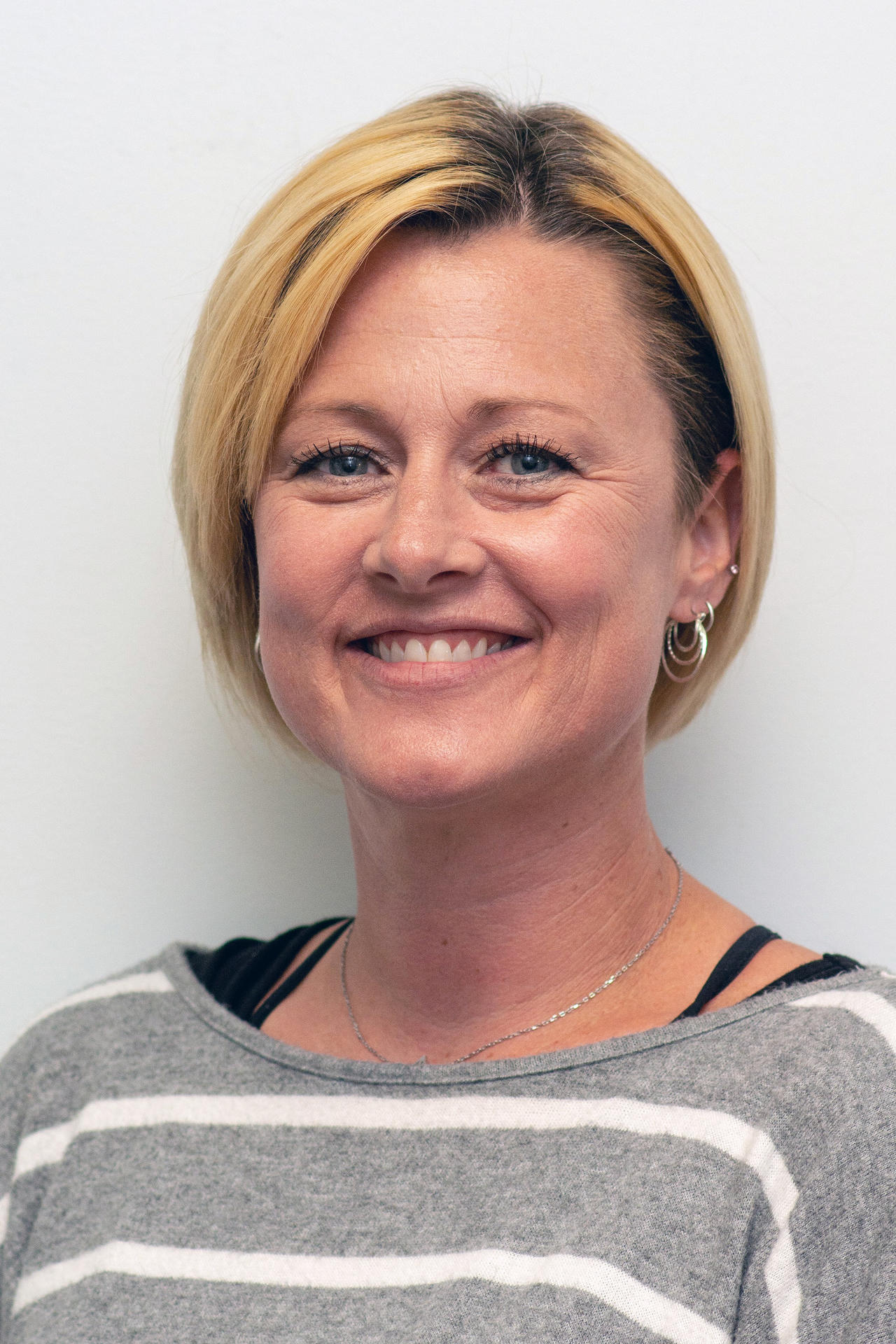 Jennifer Markello | About ROE26