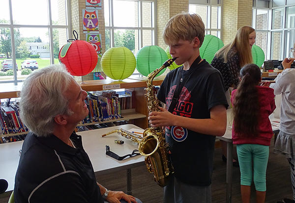 Fifth Graders Explore Instruments at Beginning Band Presentation | District
