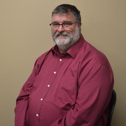 Carl Moore | About Us