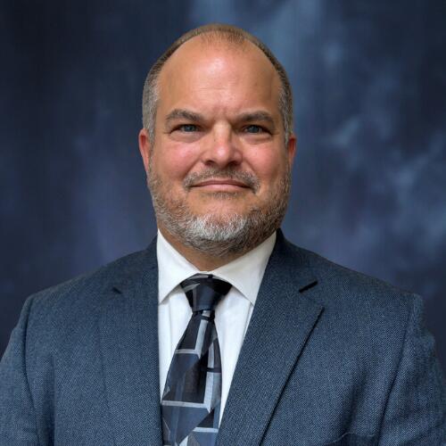 Dr. Adam Kurtz | System