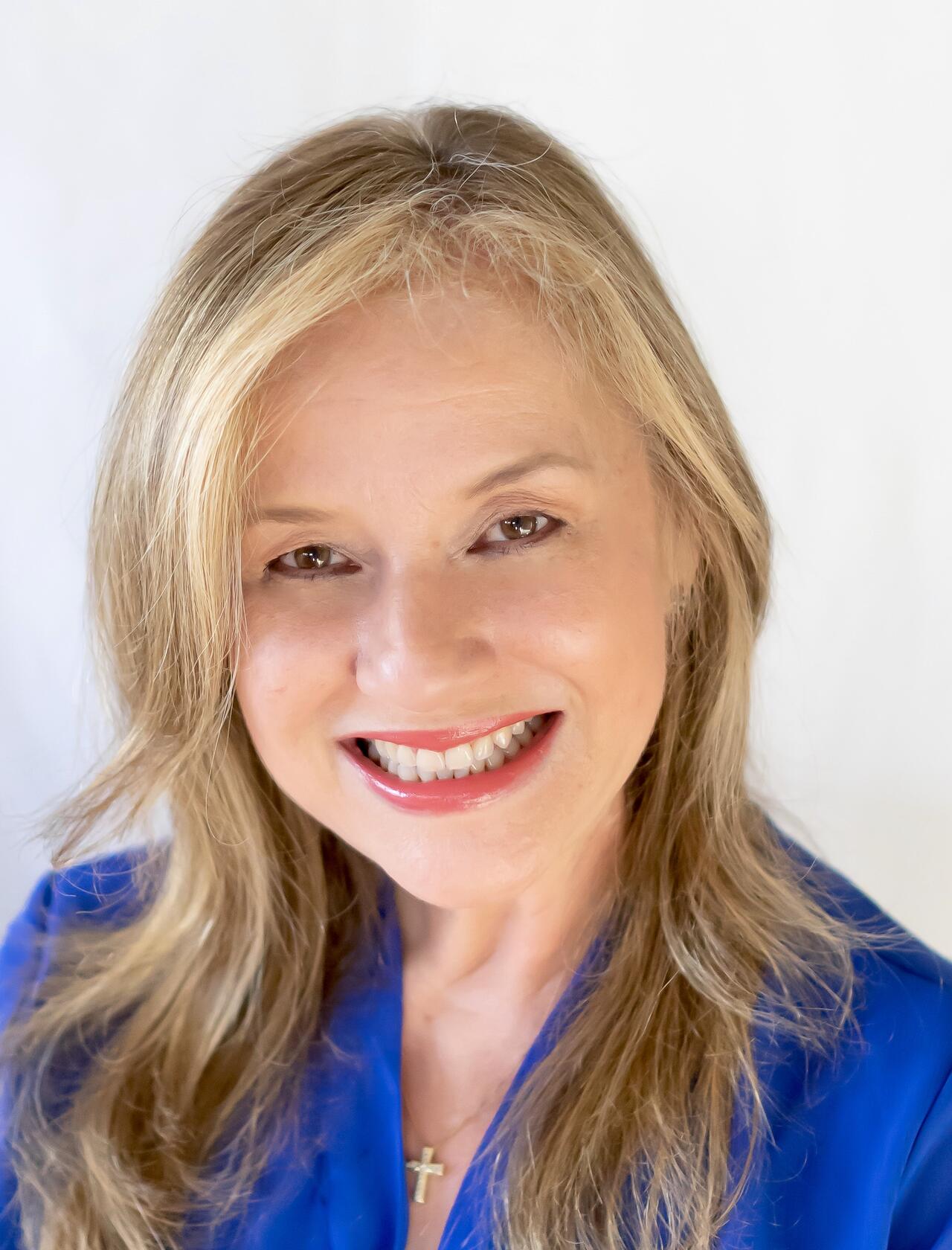 Dr. Mary Ann Torres | Our School